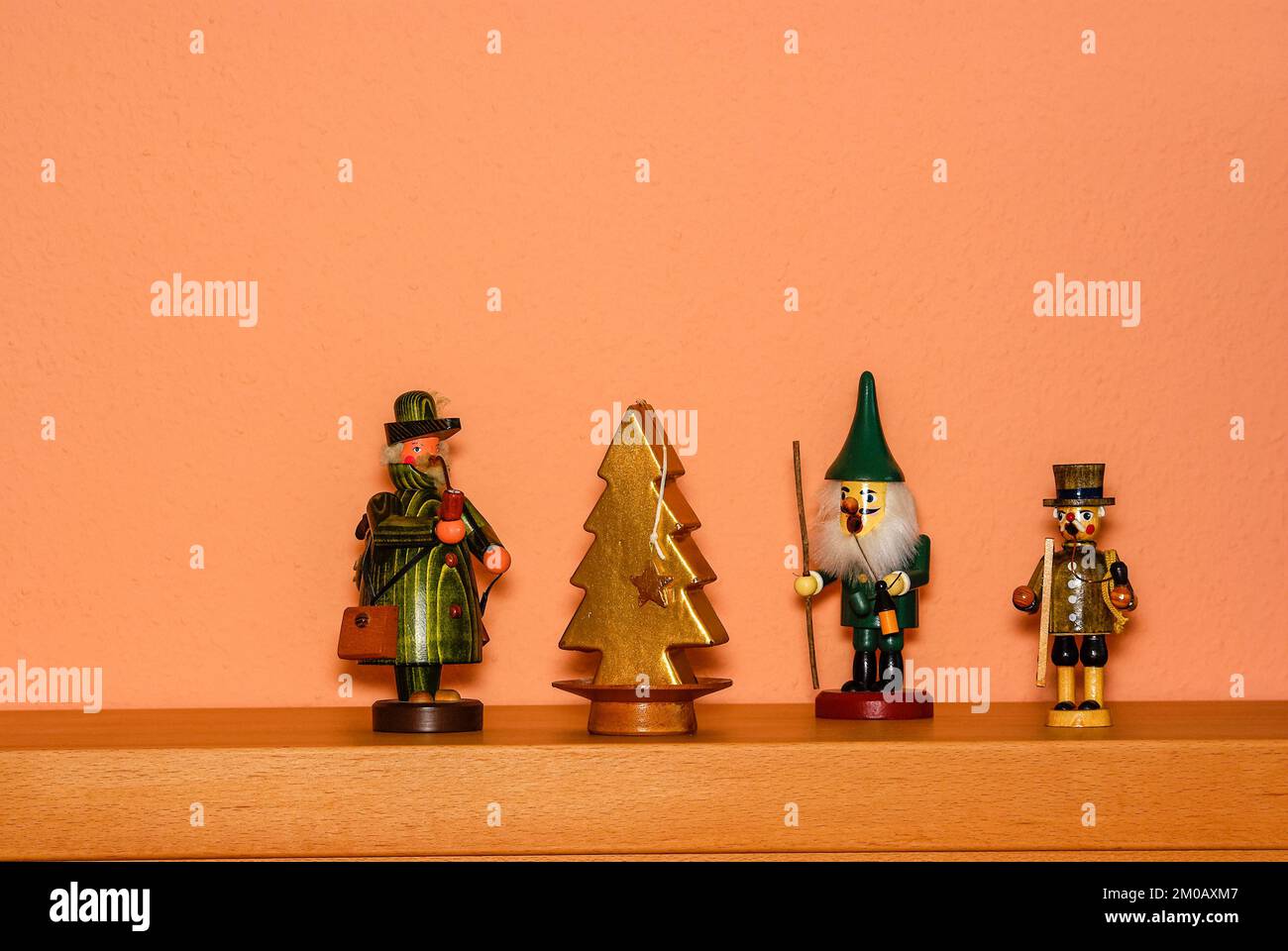 Christmas decoration consisting of three incense smokers and a candle ...