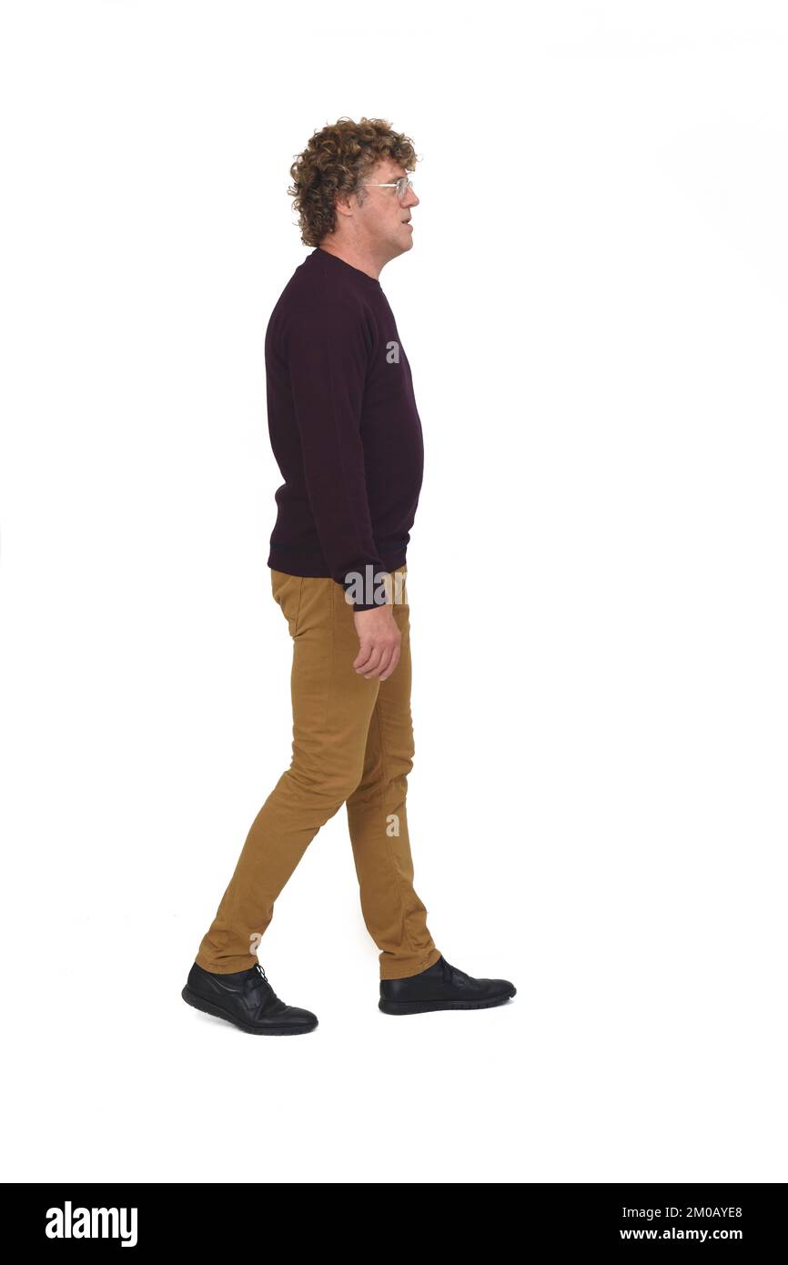 side view of a man walking on white background Stock Photo - Alamy