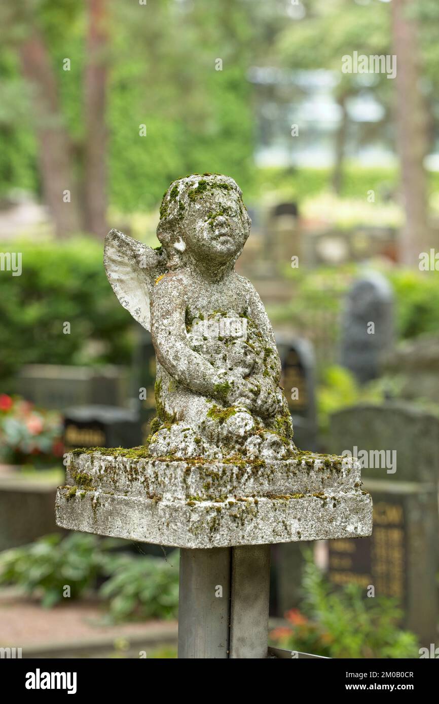 Stone sculpture of an angel in cemetery Stock Photo - Alamy