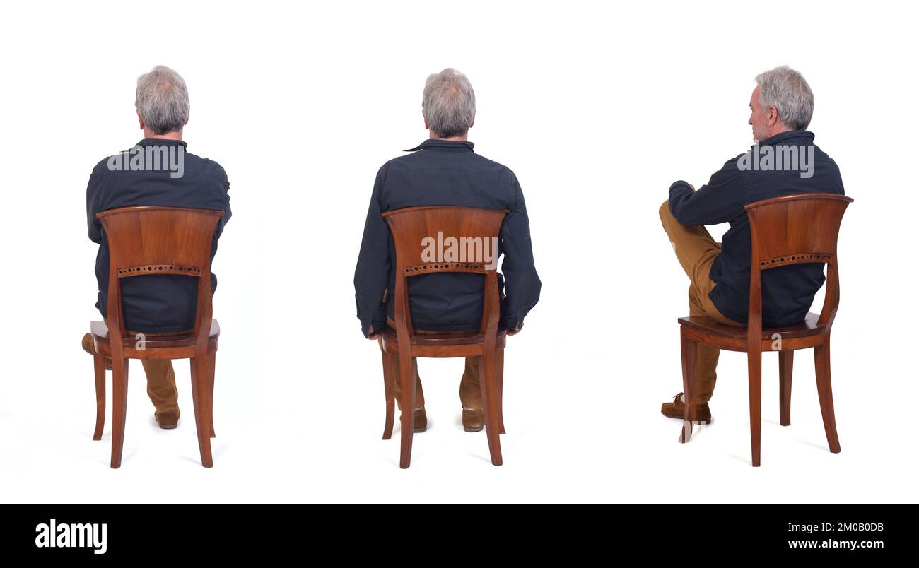 back view of same man sitting on chair on white background Stock Photo ...