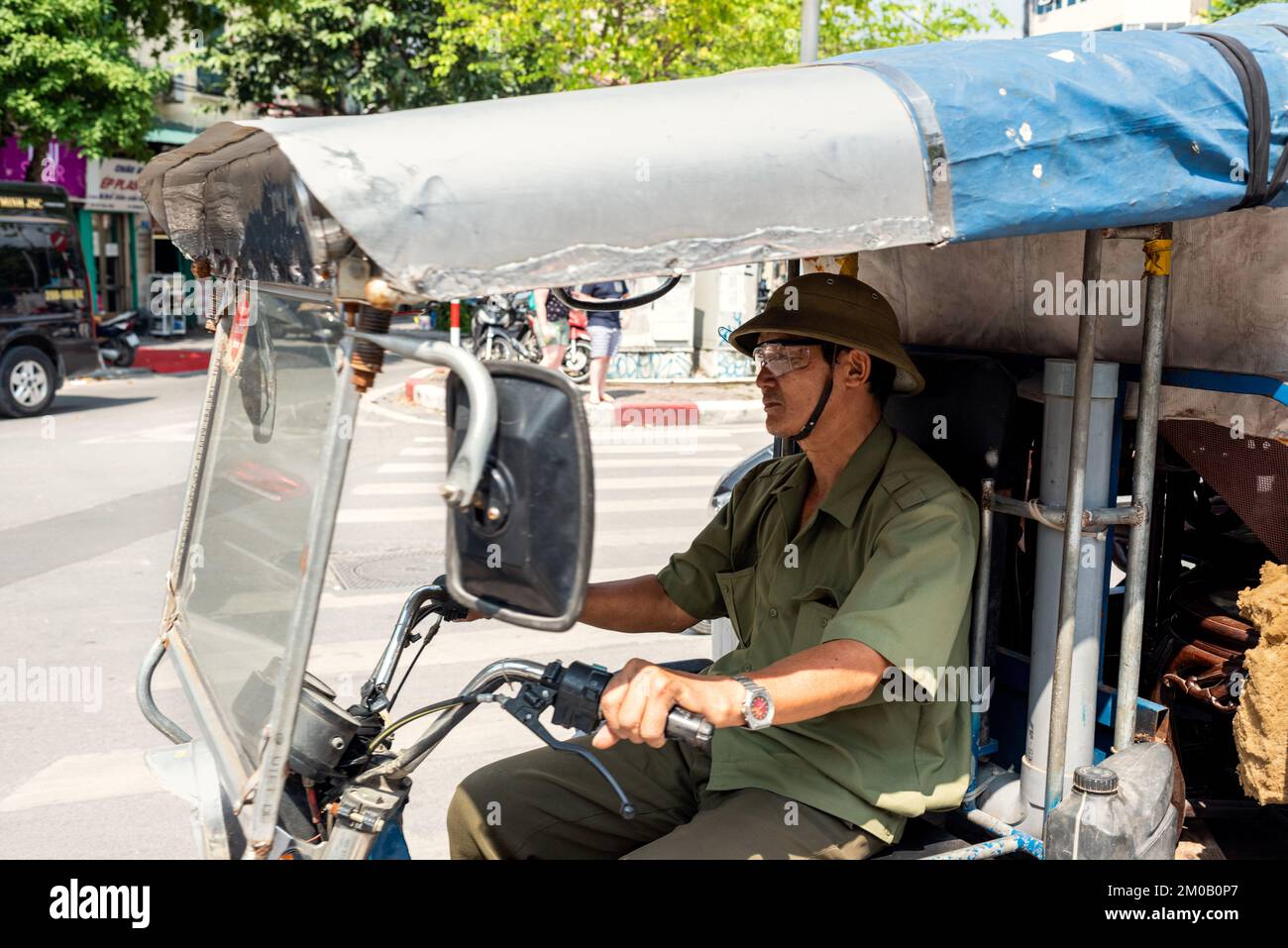 Tricycle driver hi-res stock photography and images - Alamy