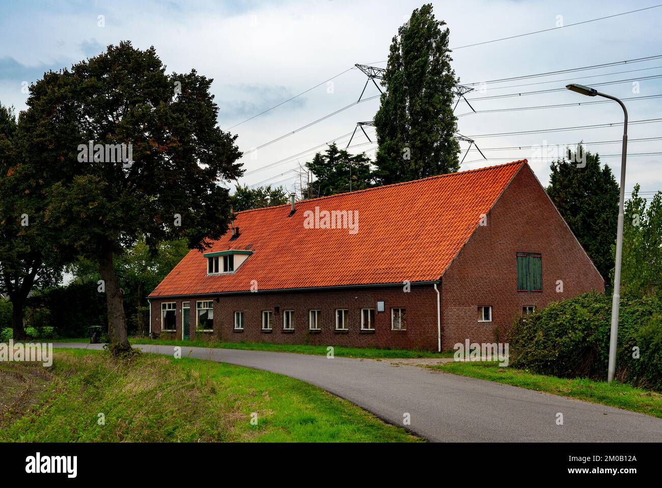Tilburg, Netherlands. Abandoned farm house and stable barn, left behind ...