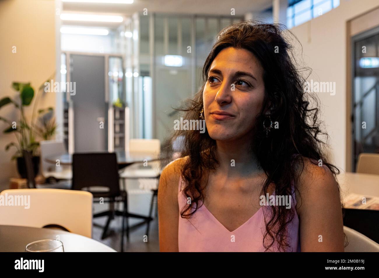Amsterdam, Netherlands. Portrait of a Syrian, refugee female journalist ...