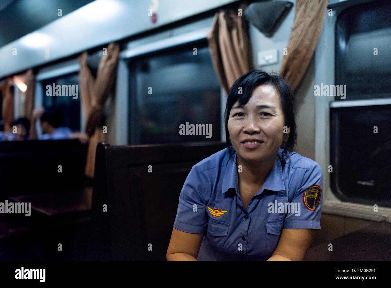 Hanoi, Vietnam; September 16, 2018: Train employee poses smiling in ...