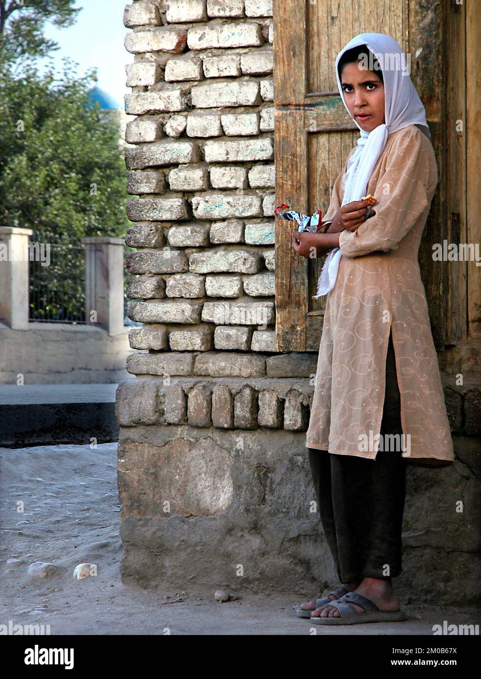 Maymana, Faryab Province / Afghanistan: A girl is standing in the ...
