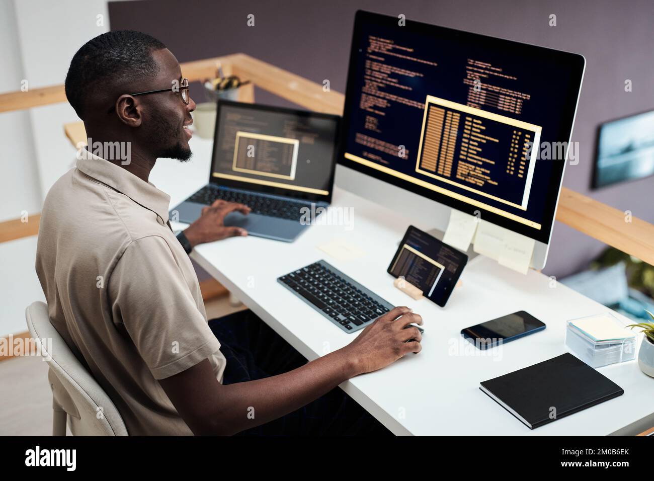 Typing developer examining code hi-res stock photography and images - Alamy