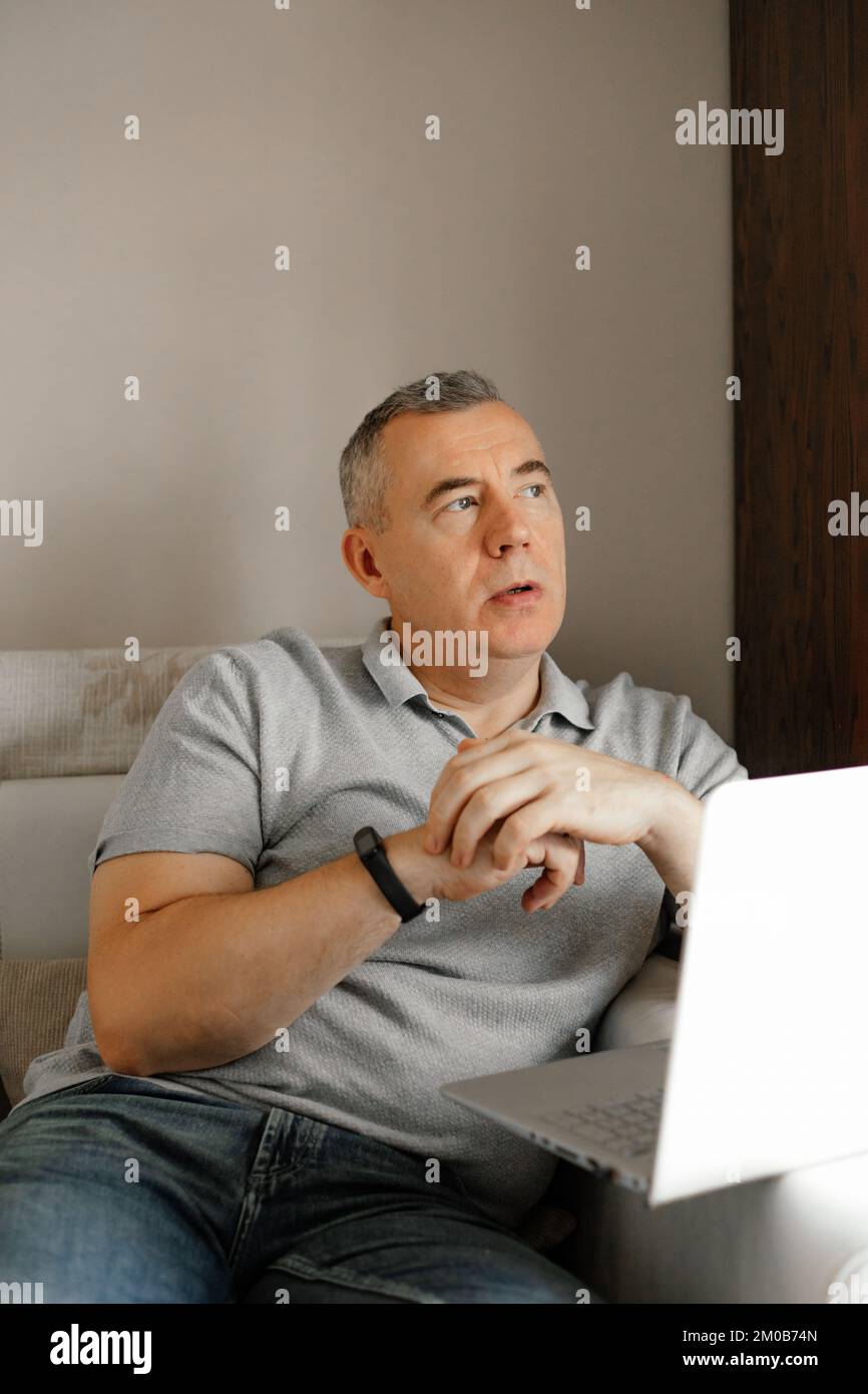 Remote portrait middle aged hi-res stock photography and images - Alamy