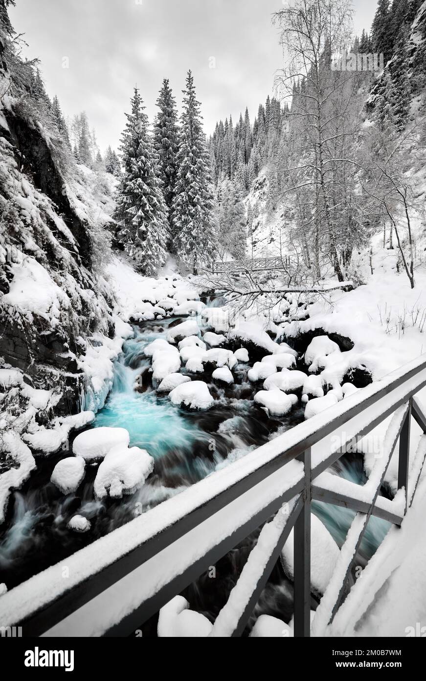 Beautiful scenery of the turquoise mountain water river and bridge near ...