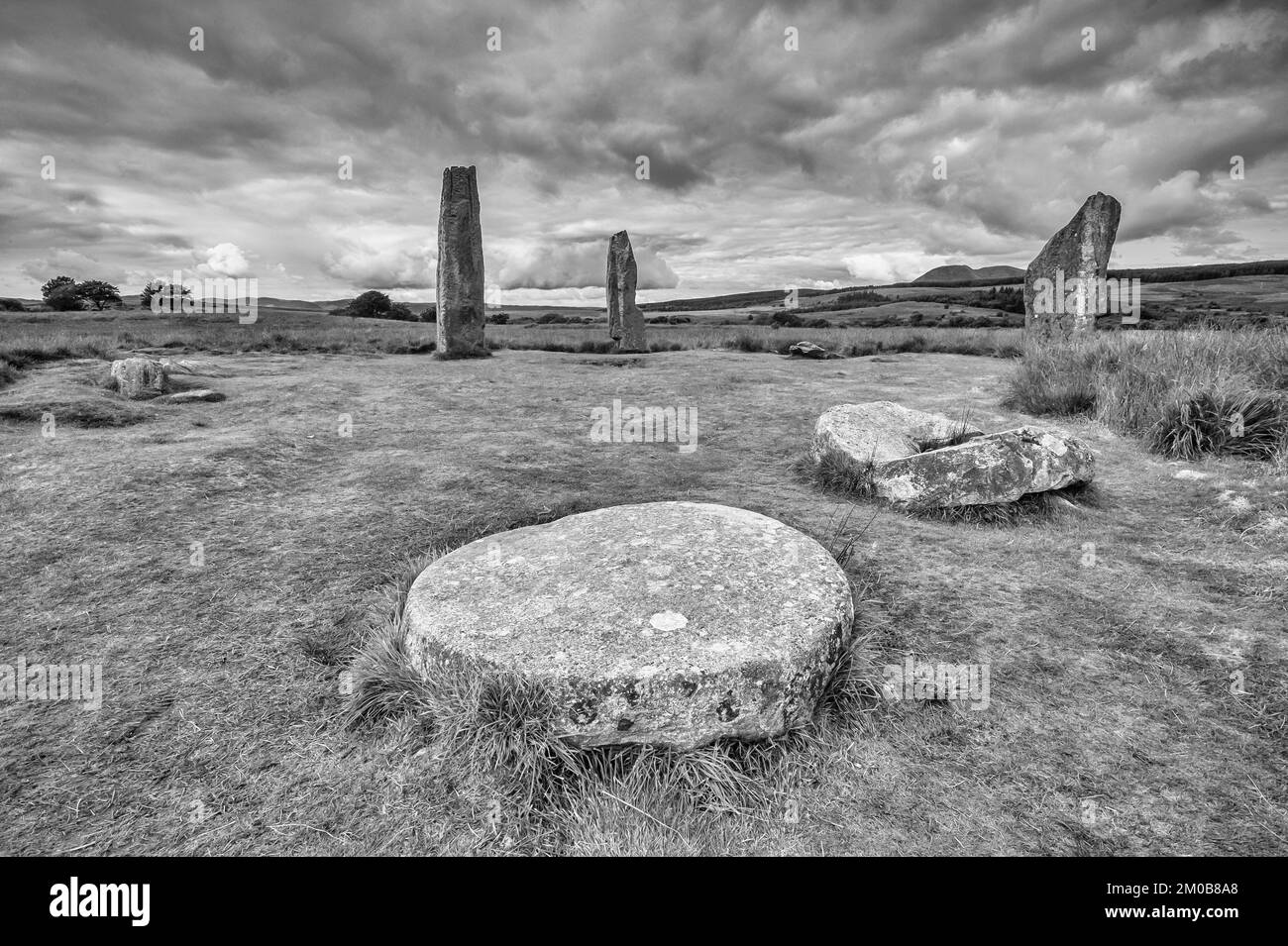 The image is of the Machrie standing stone circle thought to be around ...