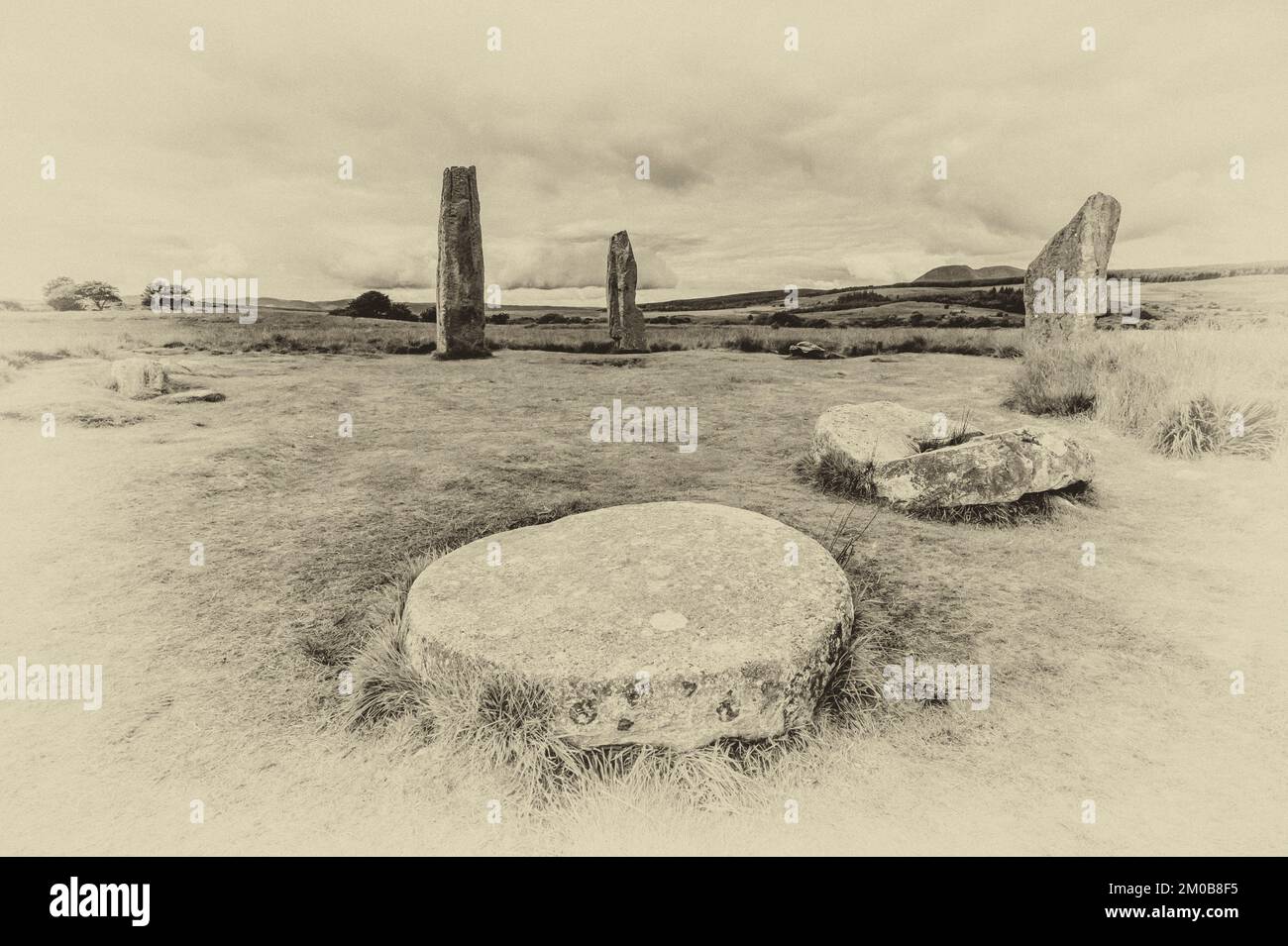 The image is of the Machrie standing stone circle thought to be around ...