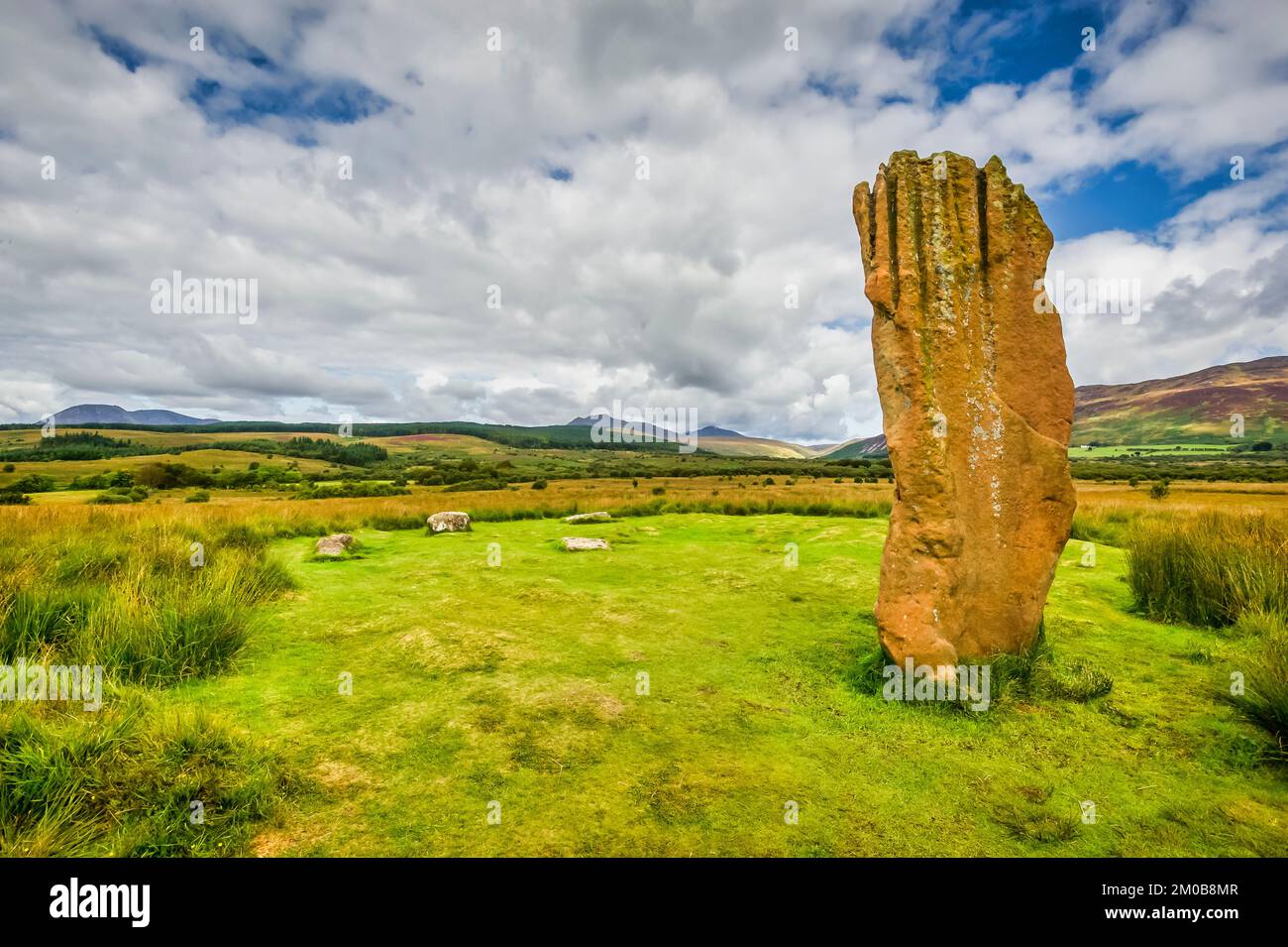 The image is of the Machrie standing stone circle thought to be around ...