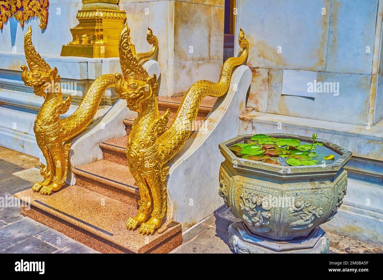 Golden Naga serpents at the entrance to Ubosot of Wat Bowonniwet Vihara ...