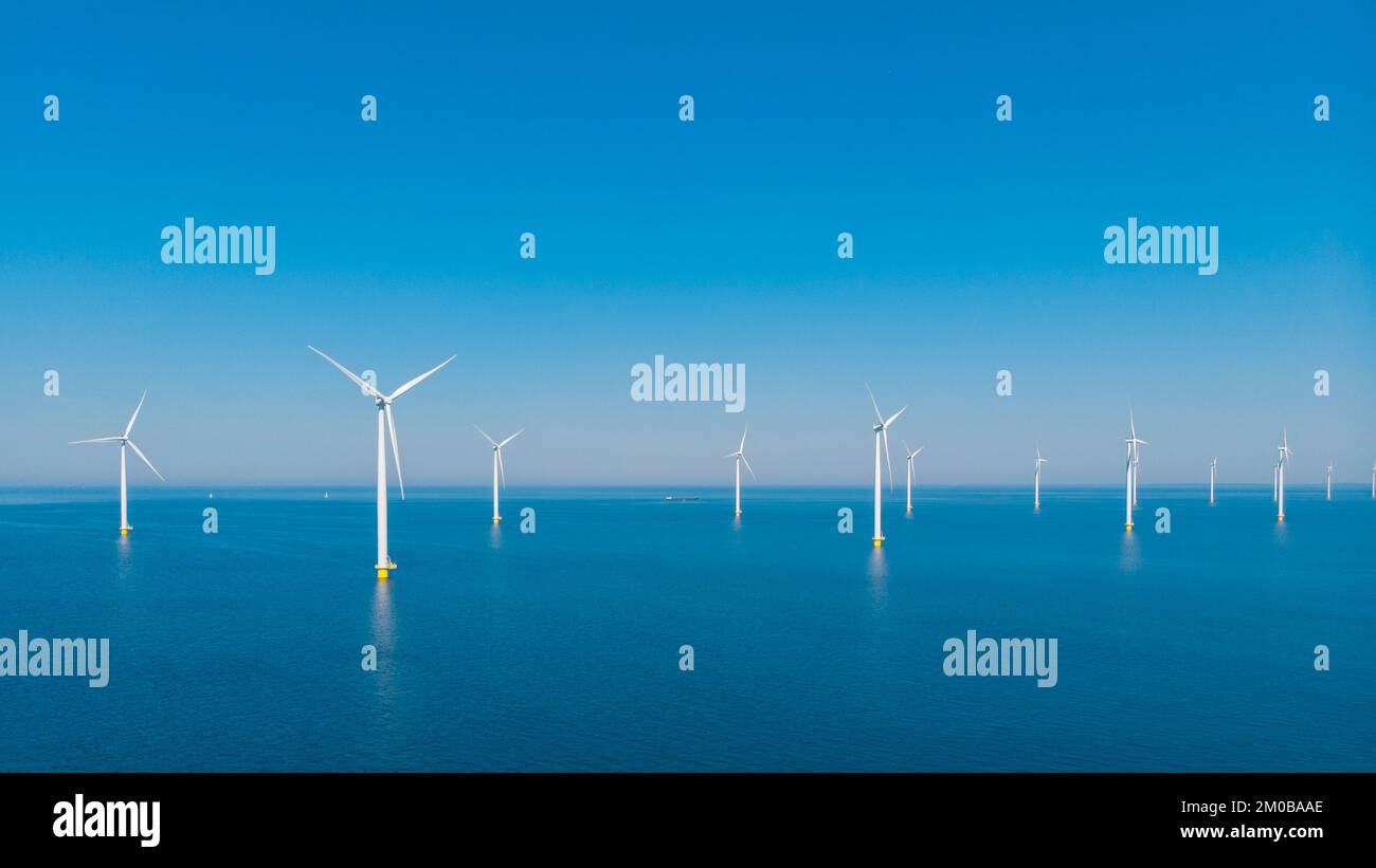 Drone view at Windmill turbines at sea , view from above at a huge ...