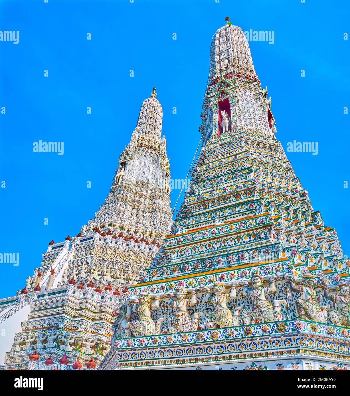 Outstanding white Prangs of Wat Arun with colorful porcelain ...