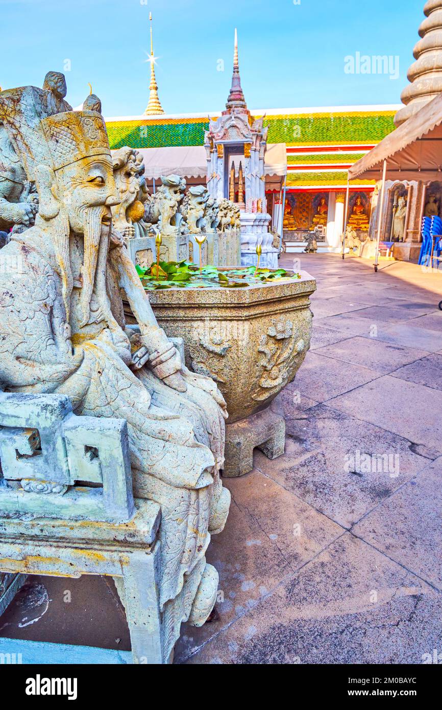 The stone sculpture of the Chinese Sage in the courtyard of Wat Arun ...