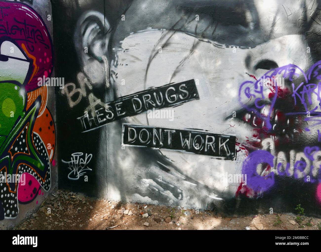 Graffiti art galleria with a write up on the wall 'these drugs don't ...