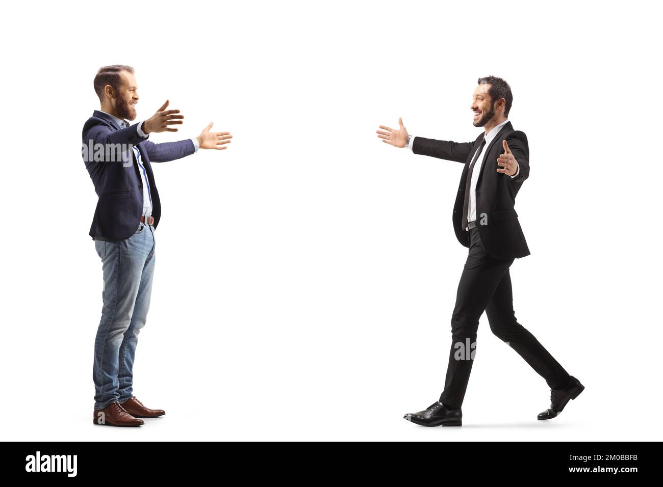 Two young professional men meeting and greeting each other isolated on ...