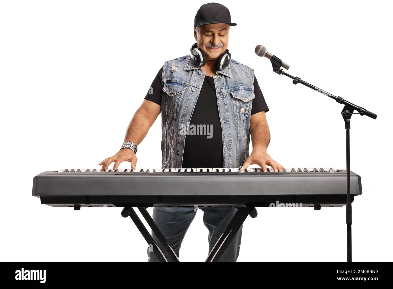 Singing and playing keyboard Cut Out Stock Images & Pictures - Alamy
