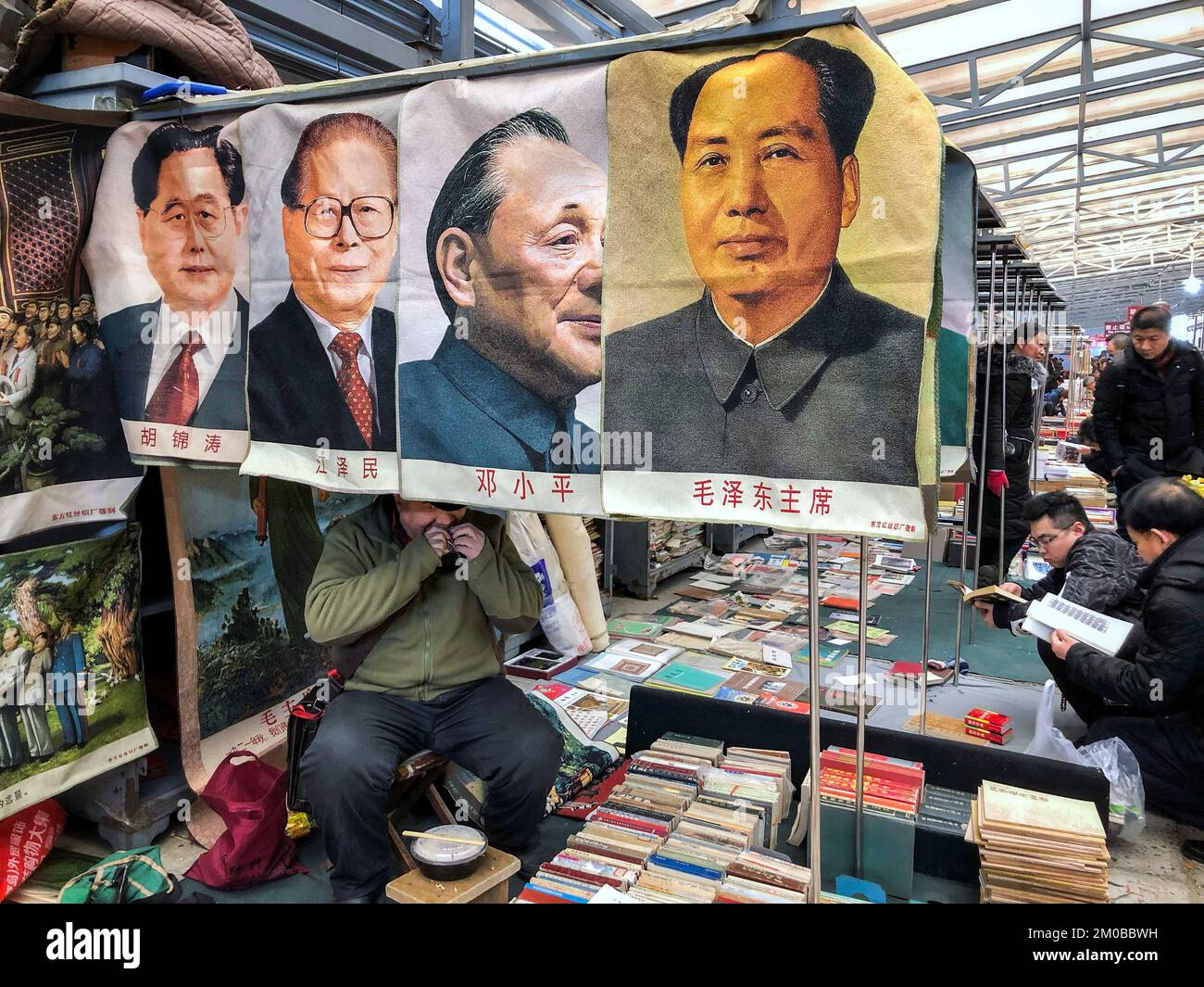 Posters of previous Chinese leaders (from right to left) Mao Zedong, Deng Xiaoping, Jiang Zemin ...
