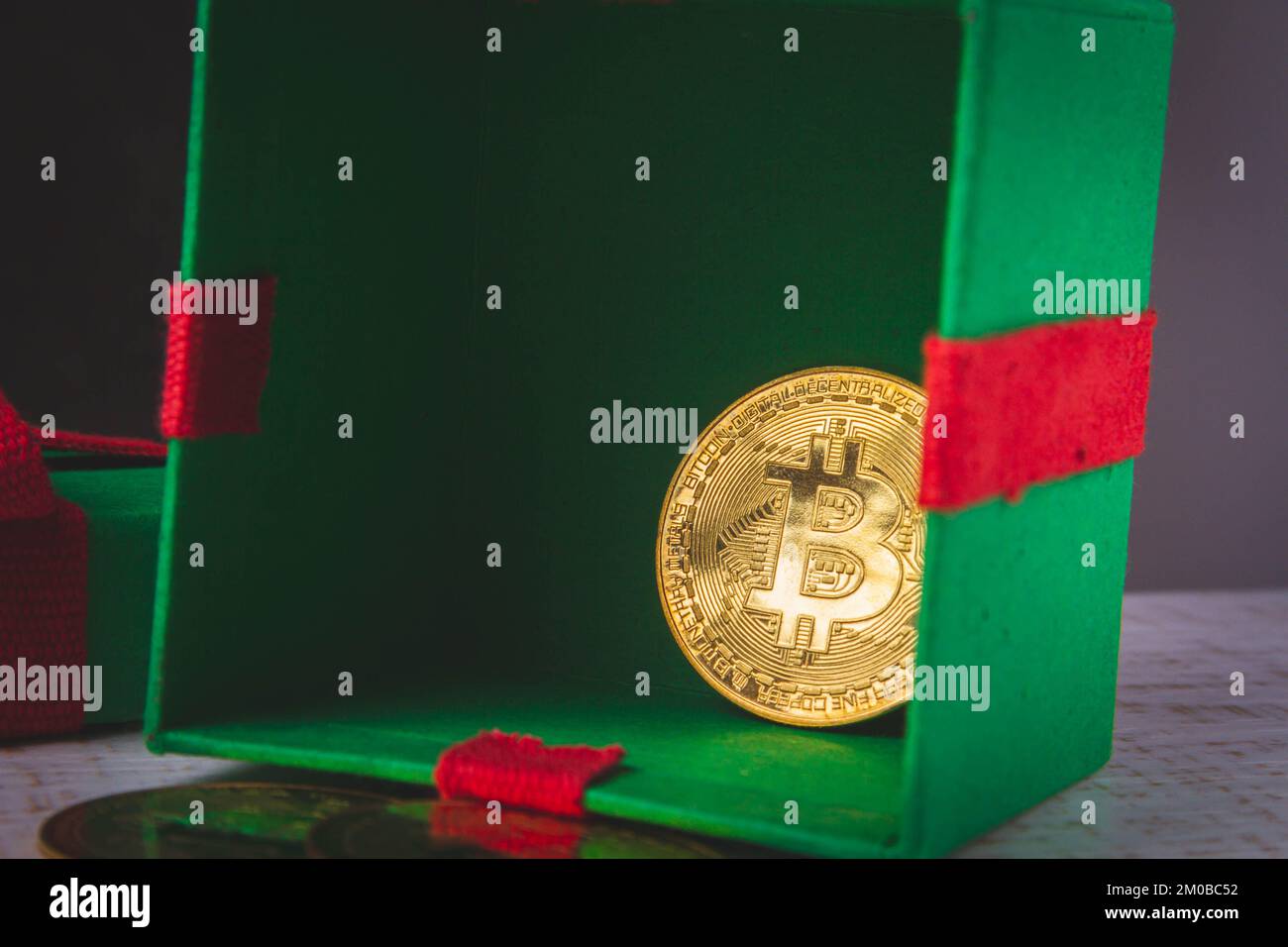 Bitcoin coin in gift box of red green color. Christmas gift Stock Photo ...
