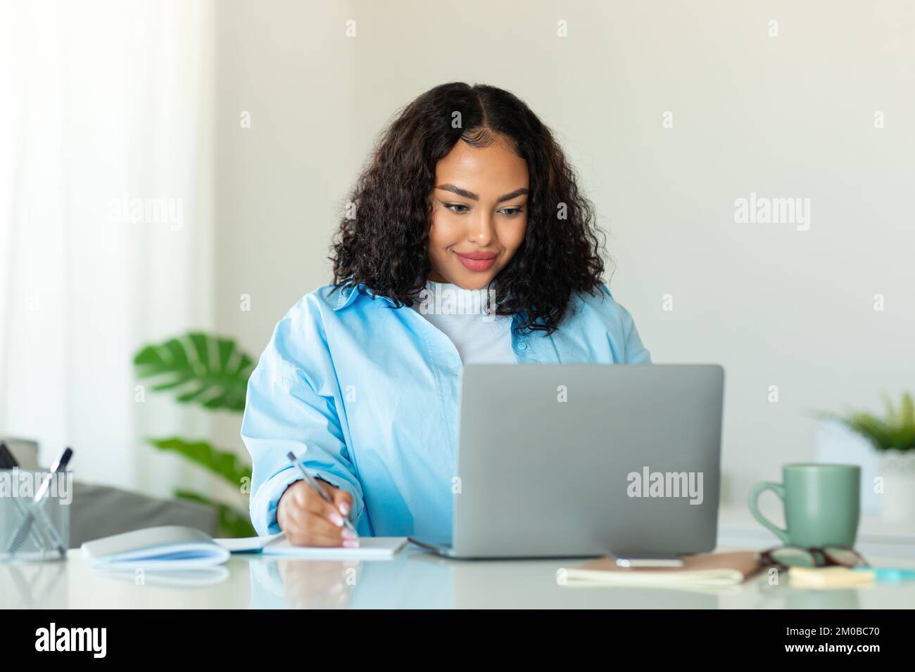 Sitting desk woman obese hi-res stock photography and images - Alamy