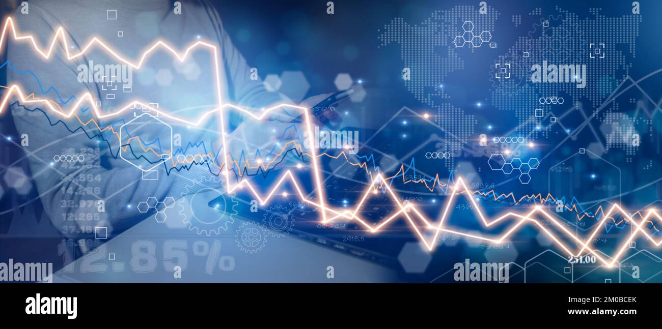Businessman with computer analyzing business graphs, finances and ...