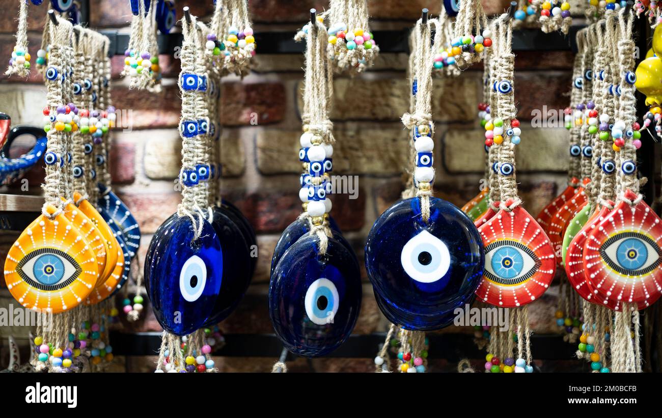 Evil eye beads and colorful beads, eye-themed Stock Photo - Alamy