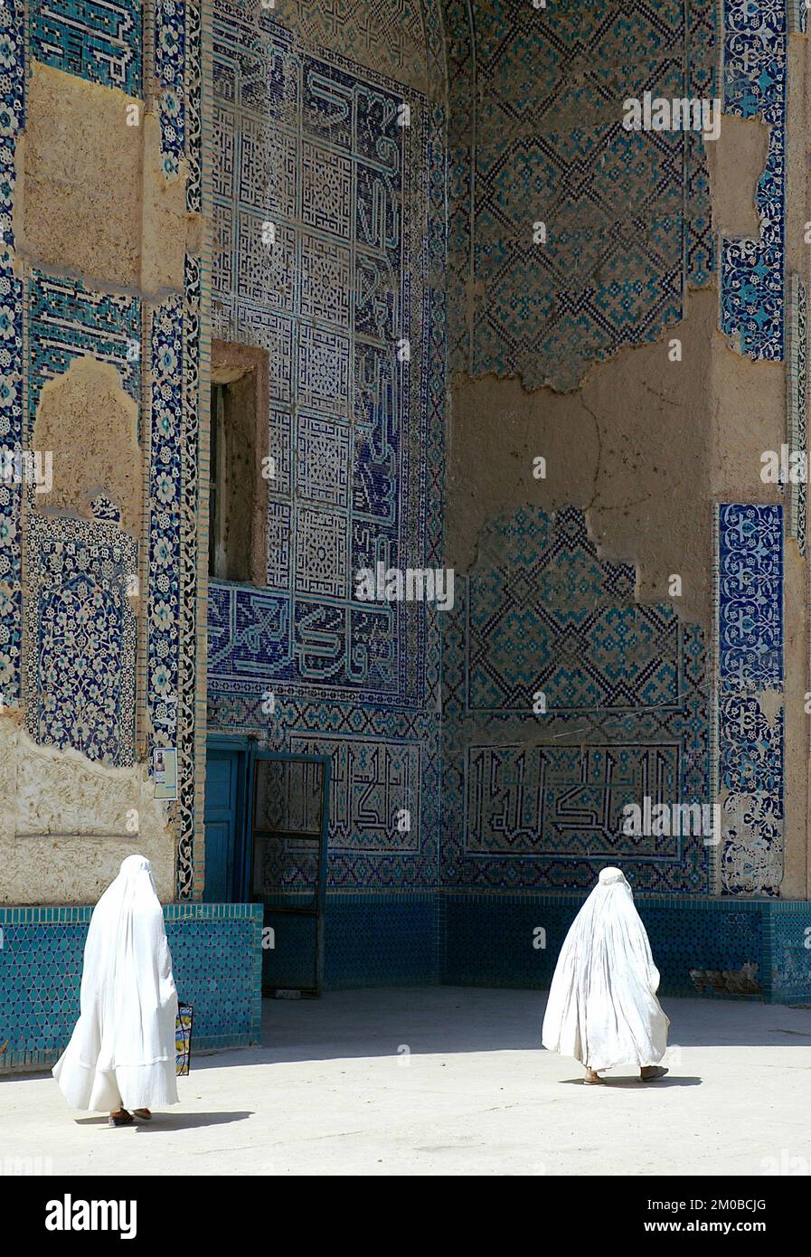 Two women in white burqas (burkas) at the Shrine of Khwaja Abu Nasr ...