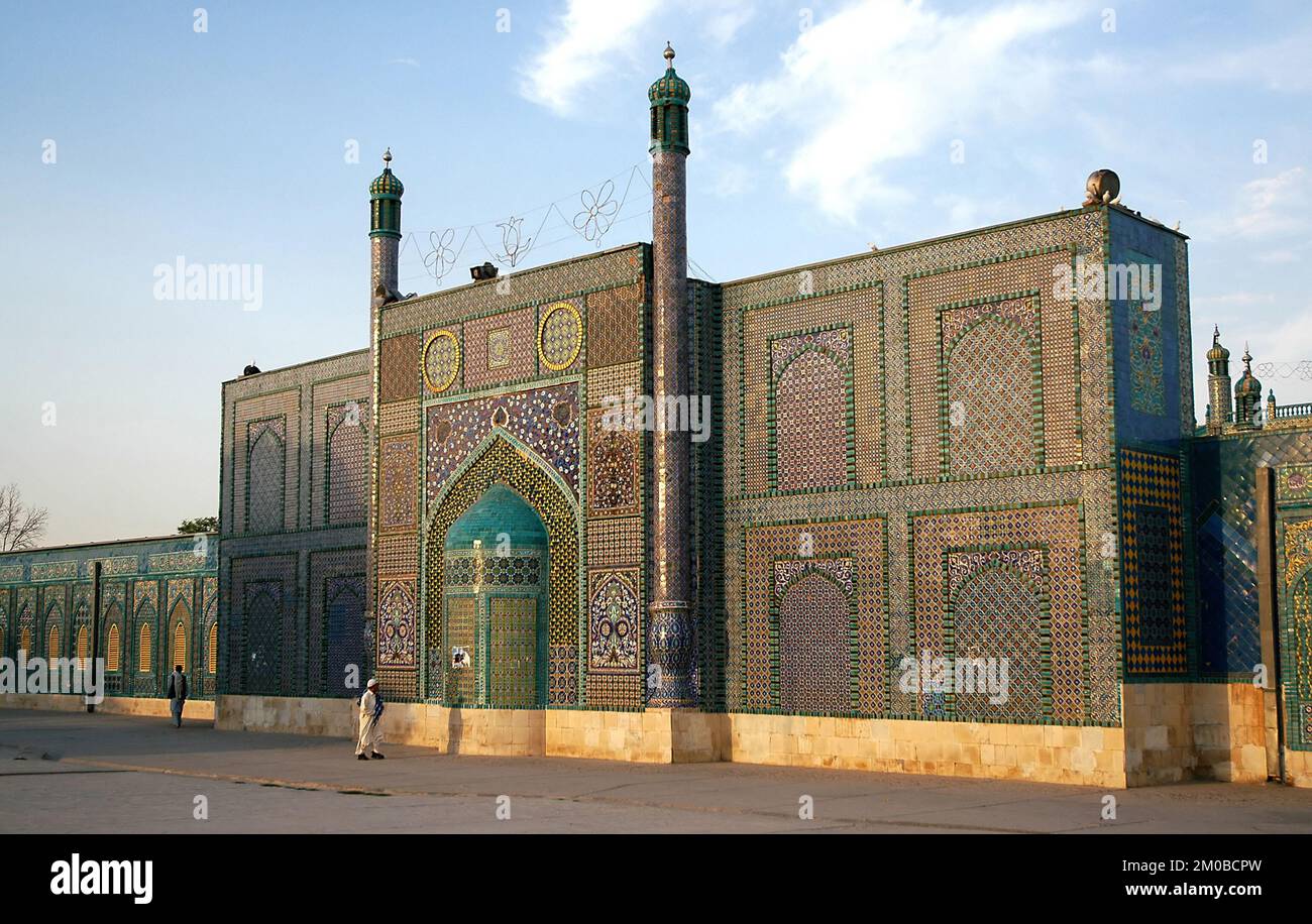 Mazar-i-Sharif, Balkh Province in Afghanistan. Two men walk past the ...