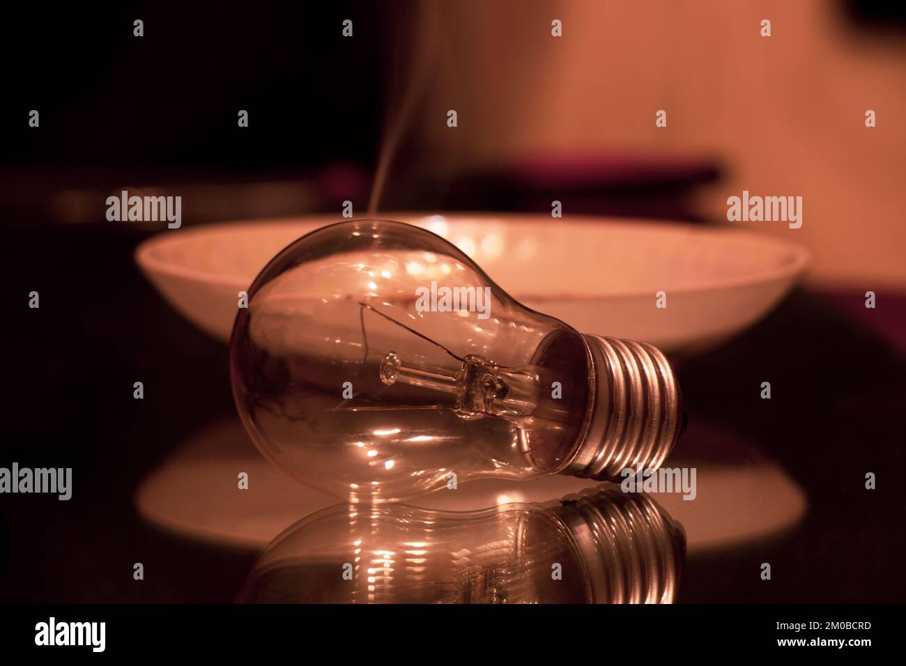 Light bulb in house off hi-res stock photography and images - Alamy