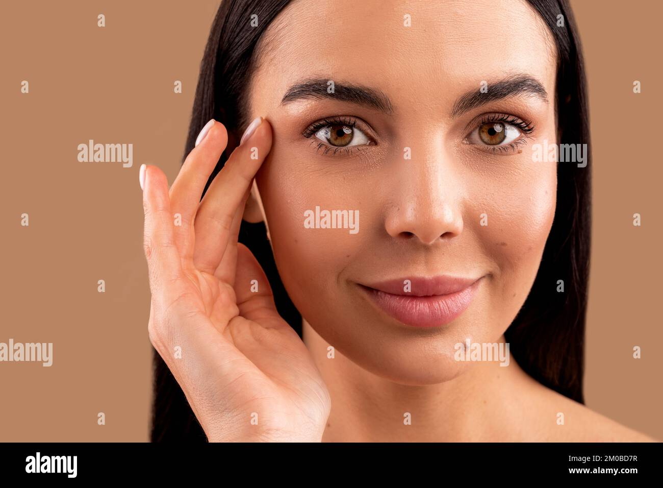 Pretty attractive brunette millennial lady touching wrinkles near ...