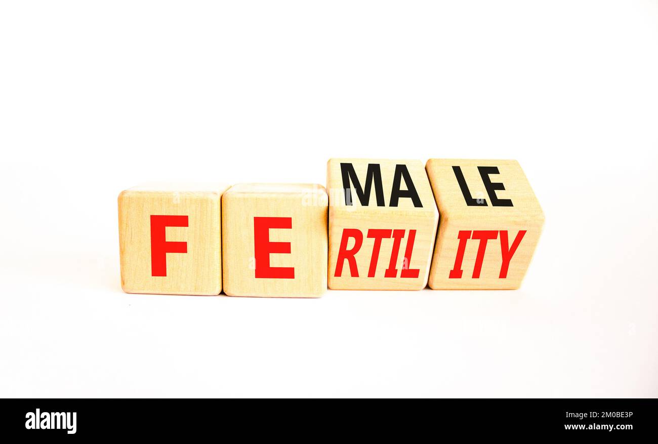 Female fertility symbol. Concept word Female fertility on wooden cubes ...