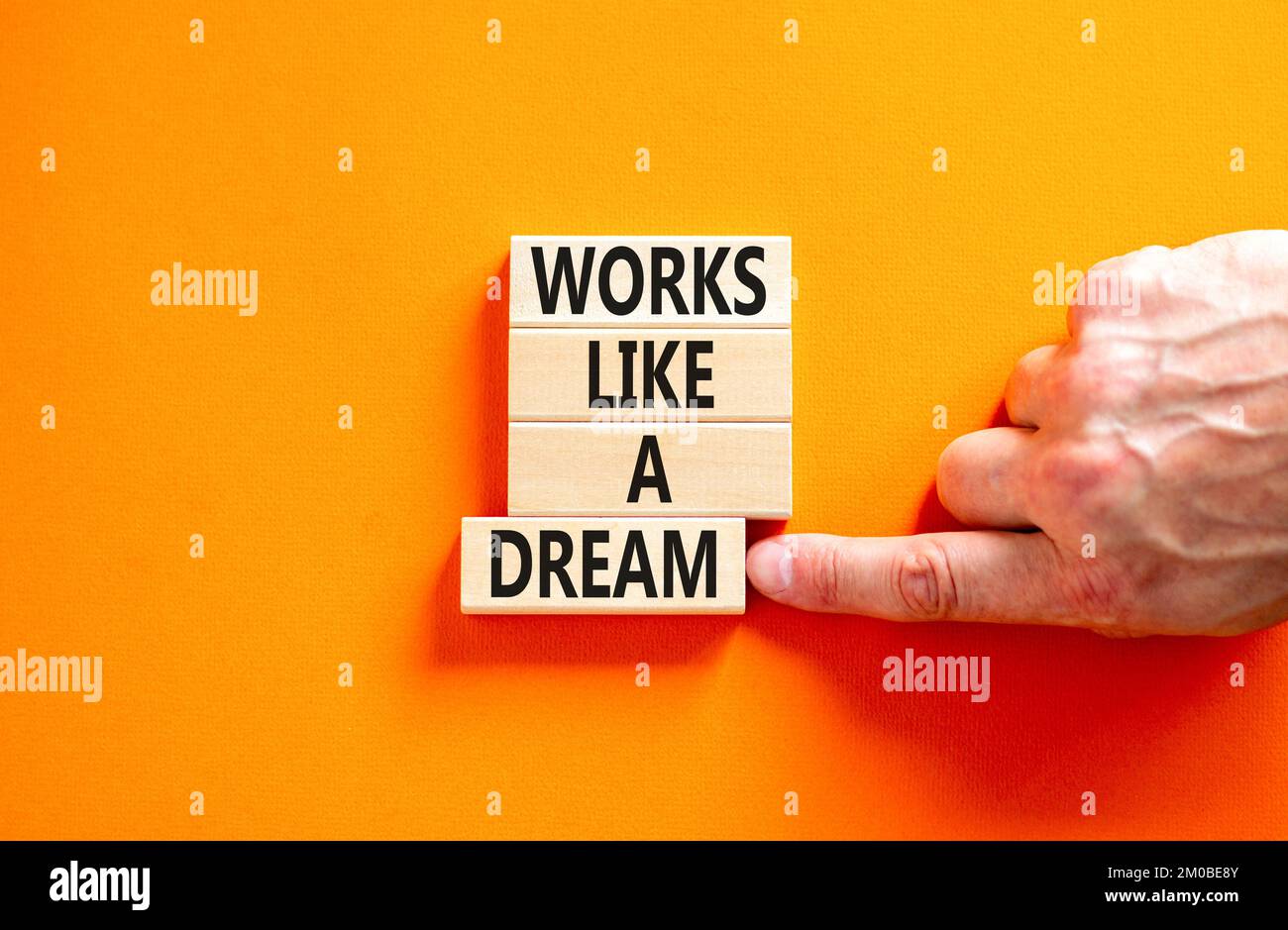 Works like a dream symbol. Concept words Works like a dream on wooden ...