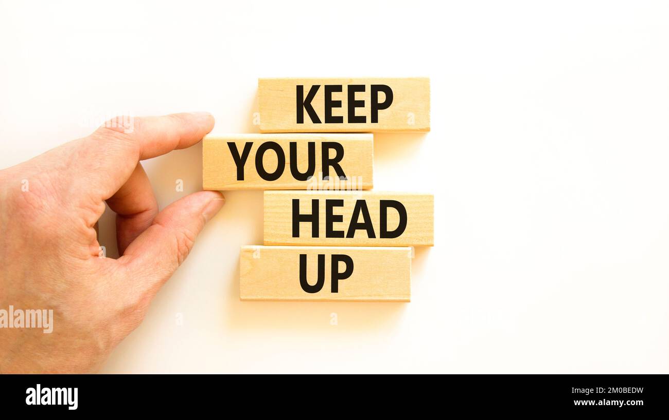 Keep your head up symbol. Concept words Keep your head up on wooden ...