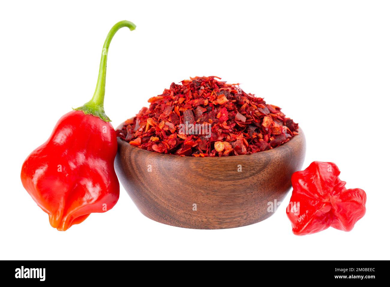 Fresh and dry ground red chili peppers isolated on white background ...