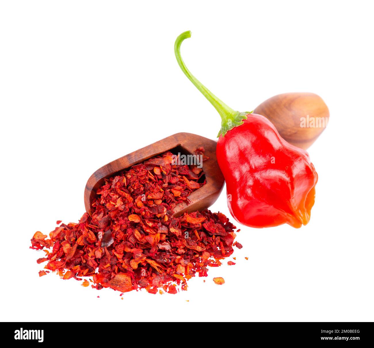Fresh and dry ground red chili peppers isolated on white background ...
