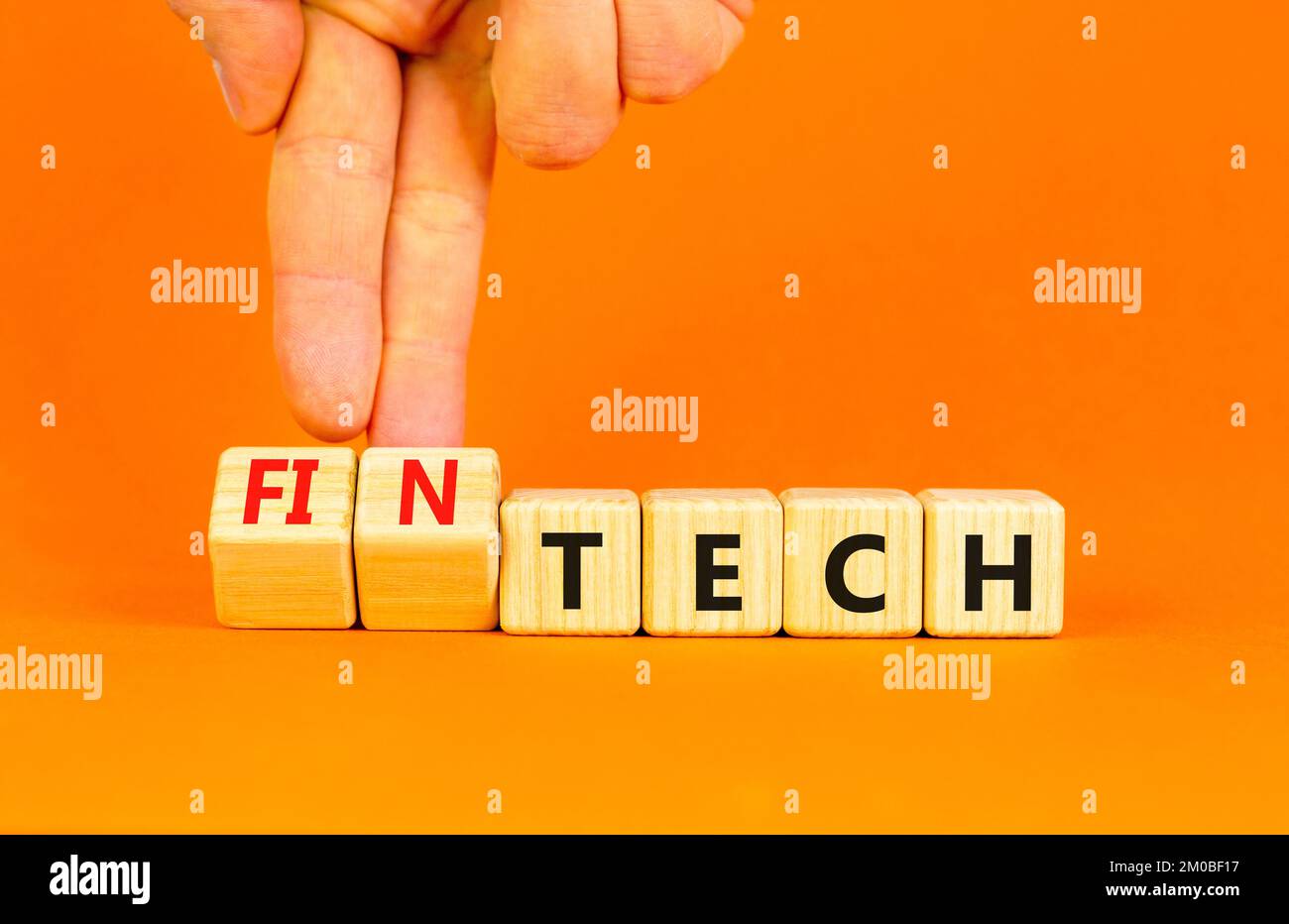 Tech or fintech symbol. Concept word Tech and Fintech on wooden cubes ...