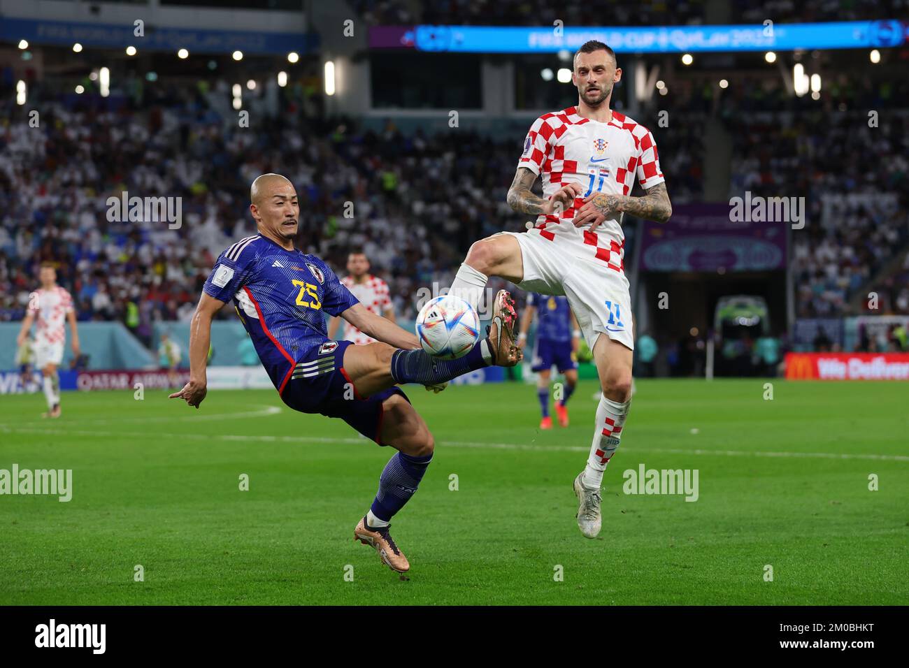 Al Wakrah, Qatar. 5th Dec, 2022. (L-R) Daizen Maeda (JPN), Marcelo ...