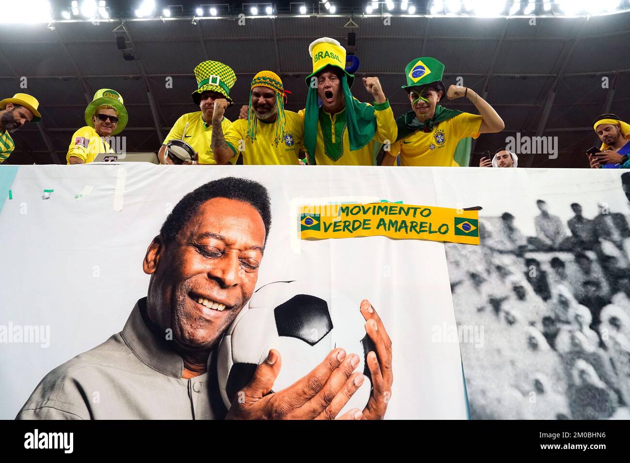 Brazil fans in the stands above a banner featuring former Brazil player ...