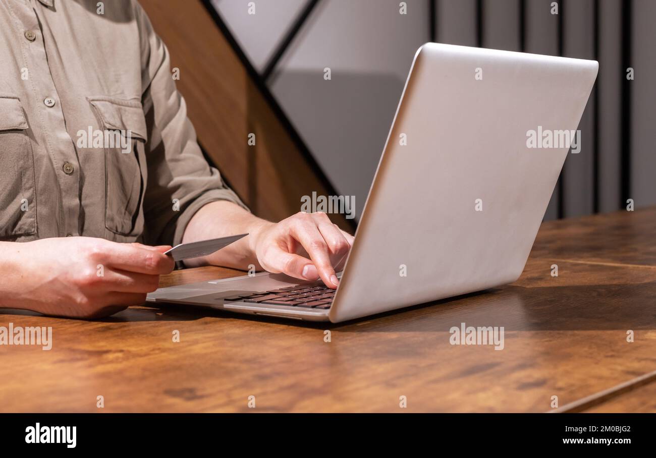 Paying with bank debit card through internet, shopping online with ...