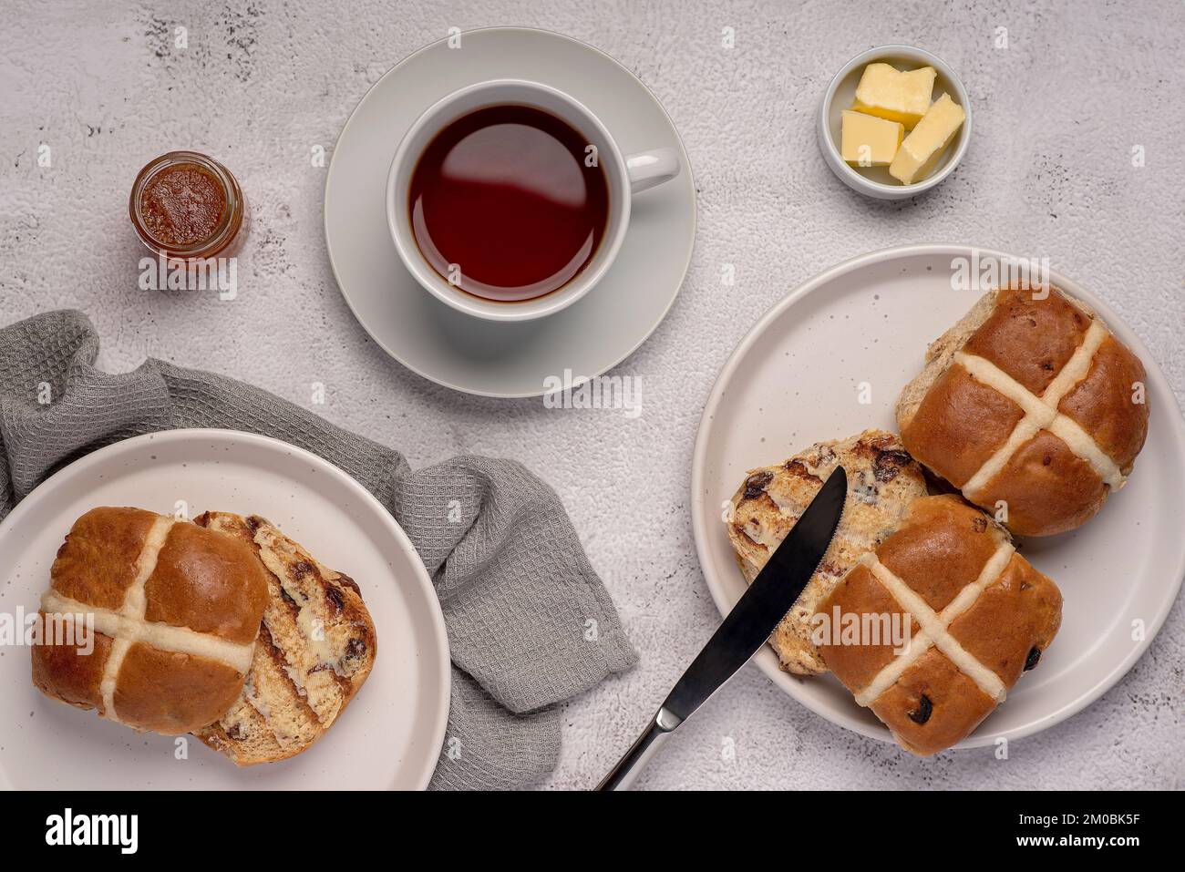 Food photography of hot cross bun, raisin, butter, english, tea, symbol ...