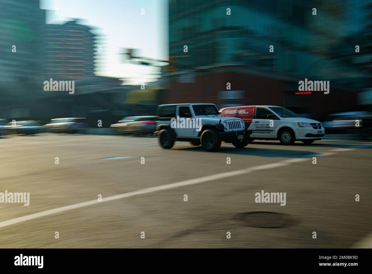 A Jeep crossing intersection in downtown Vancouver Stock Photo - Alamy