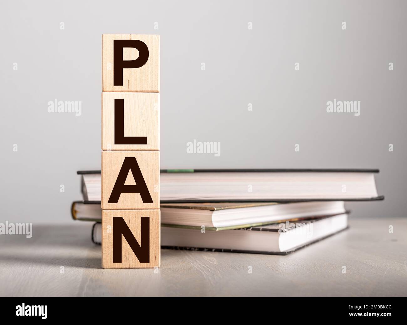 Plan word. Text on wooden cube blocks and background. High quality ...