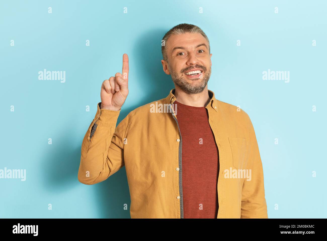 Positive middle aged caucasian man experiencing AHA moment, having ...