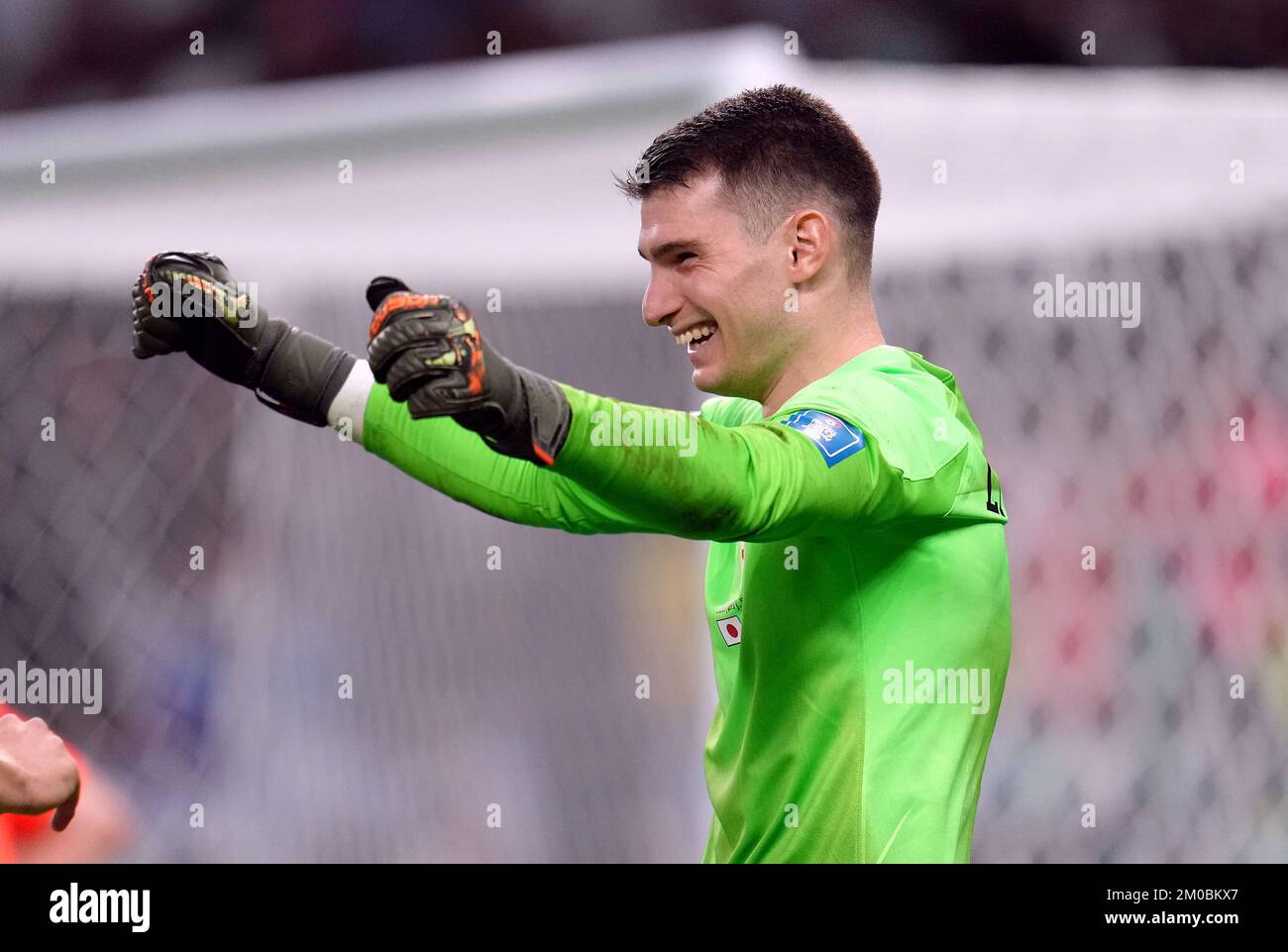 Croatia goalkeeper Dominik Livakovic celebrates winning the penalty ...