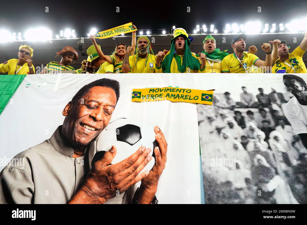 Brazil fans in the stands above a banner featuring former Brazil player ...