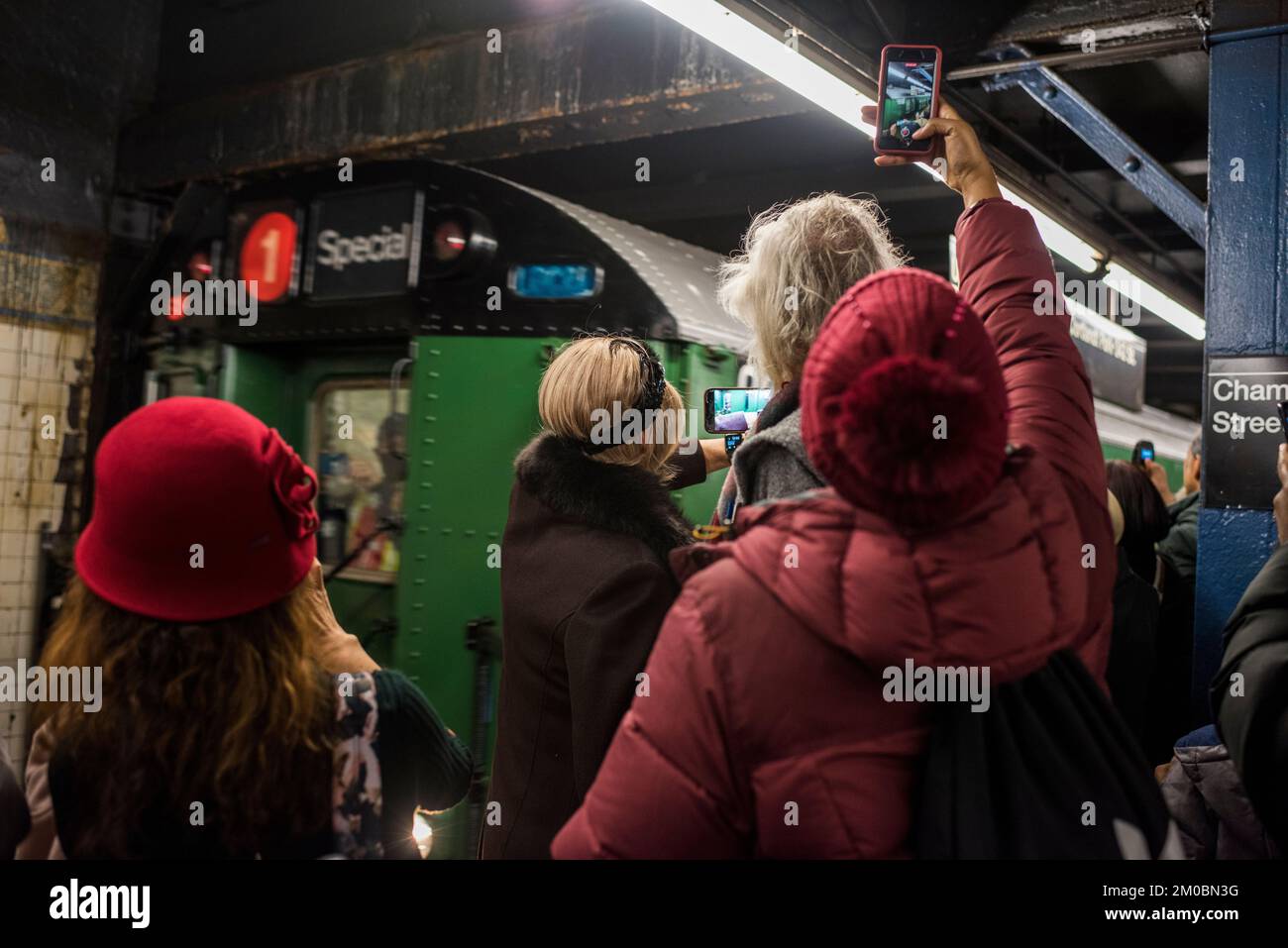 New York City, New York - December 4, 2022: People getting on the Train of Many Colors, Holiday ...