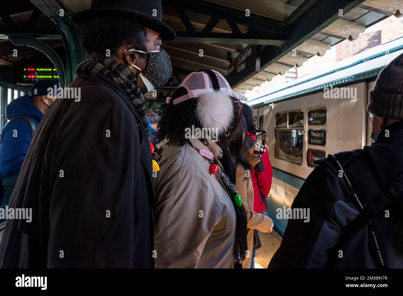 New York City, New York - December 4, 2022: People getting on the Train of Many Colors, Holiday ...