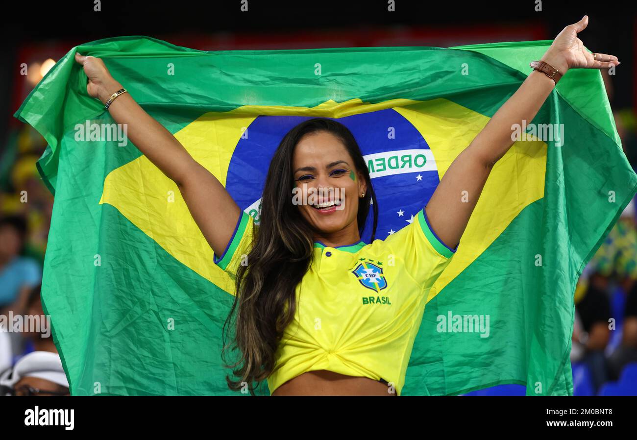 Doha, Qatar, 5th December 2022. A Brazil fan with flag during the FIFA ...