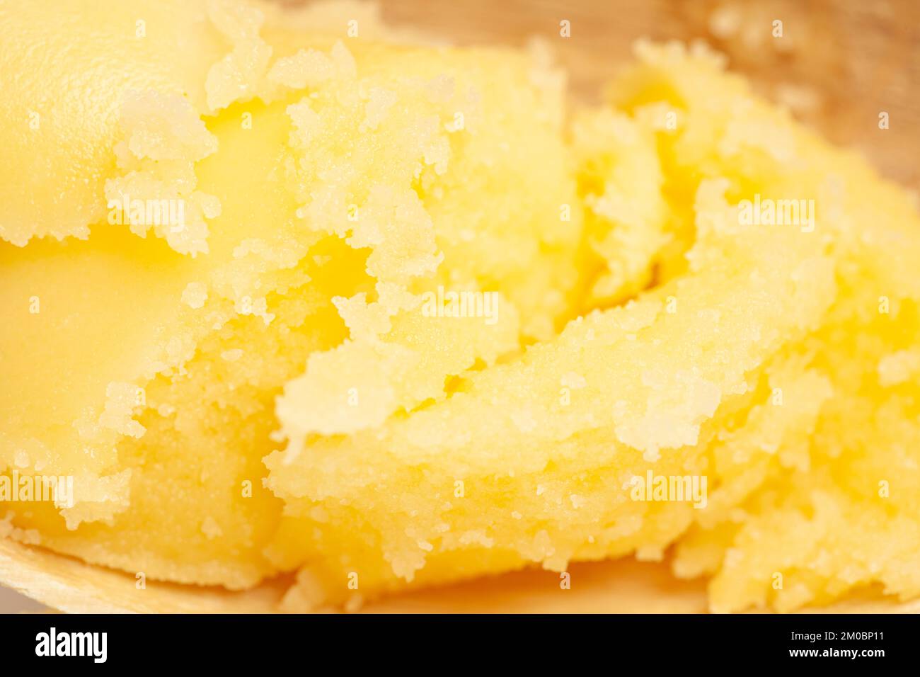 Homemade melted ghee clarified butter close up macro food background ...